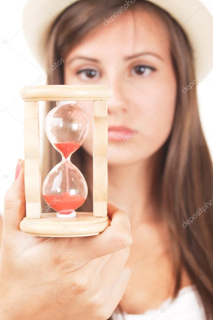 Woman with sandclock — Stock Photo © igordutina #14304335