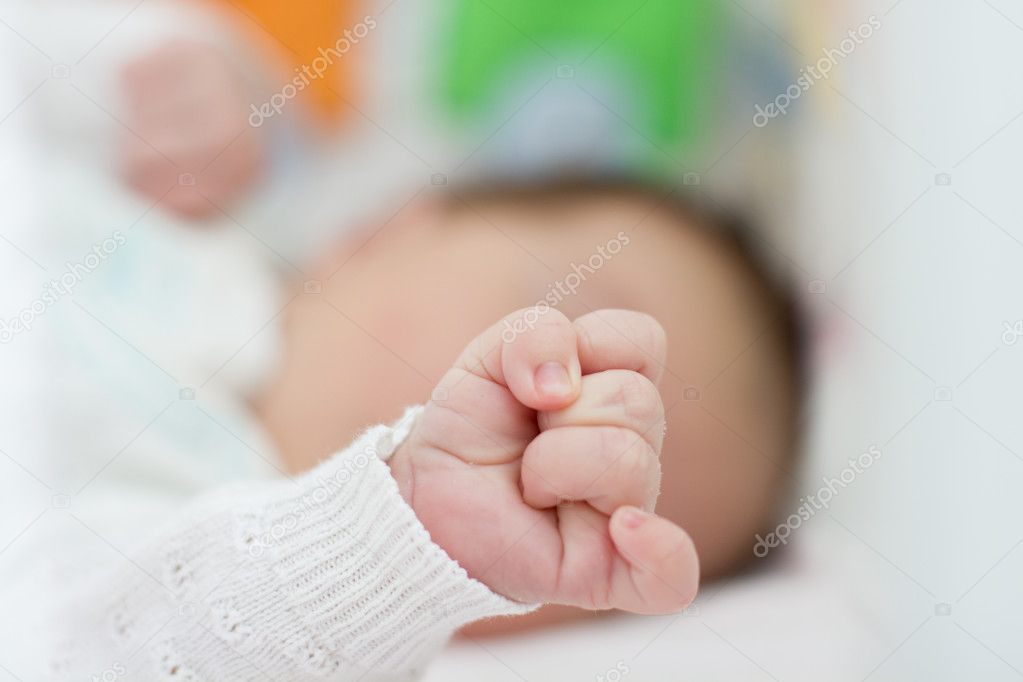 Newborn baby hand Stock Photo by ©MitaStockImages 41253113