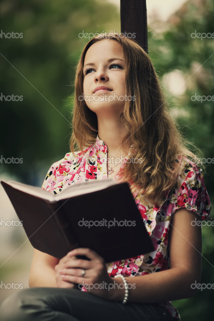 Beautiful girl reading book Stock Photo by ©ababaka 26523977