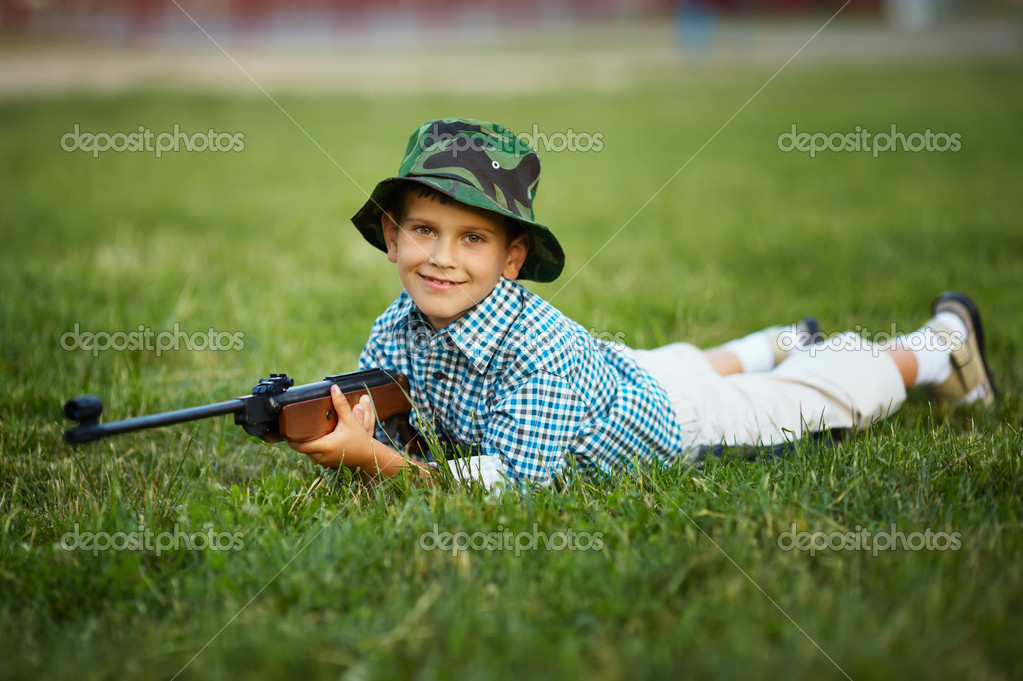 Little boy with airgun Stock Photo by ©ababaka 31198331