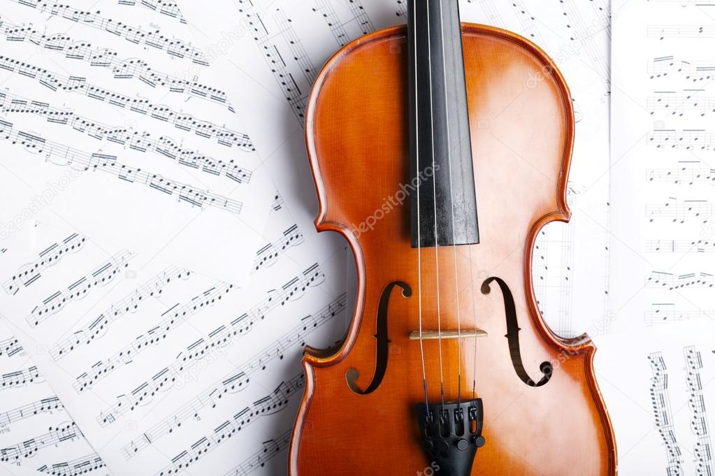 Violin on an notes background Stock Photo by ©ababaka 41614291