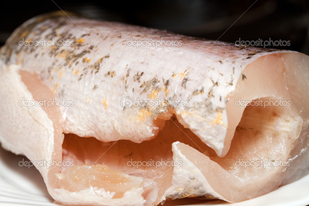Piece of fresh raw fish. The healthy diet. — Stock Photo © wjarek #27678175