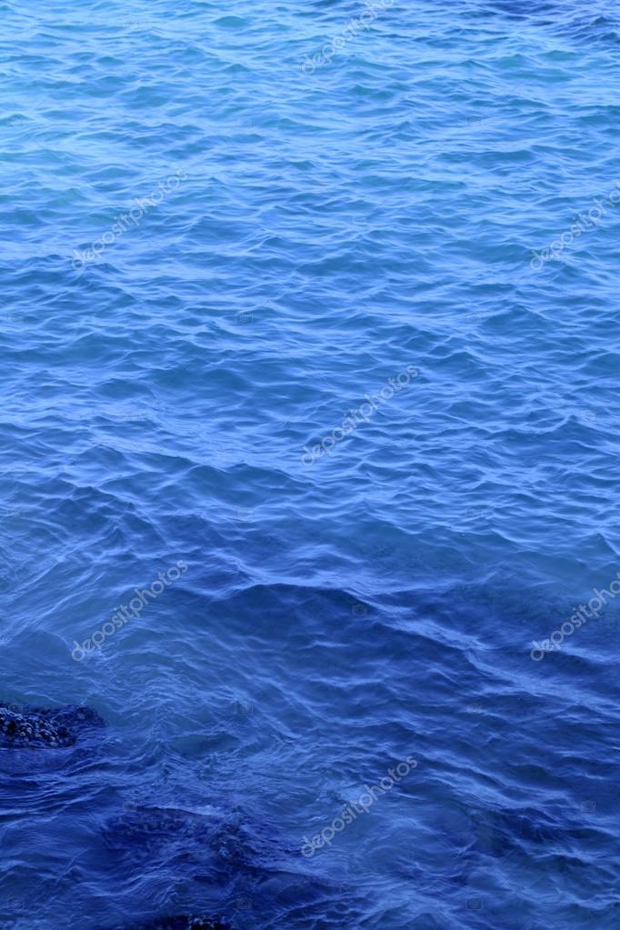 Water waves — Stock Photo © janaka #51357497