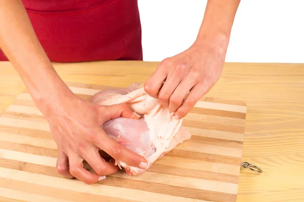 Removing chicken skin Stock Photo by ©OlafSpeier 22293353