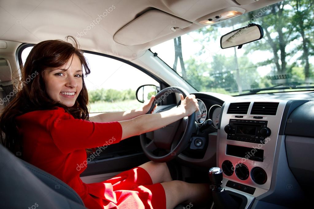 Young girl driving car — Stock Photo © luckybusiness #12630157