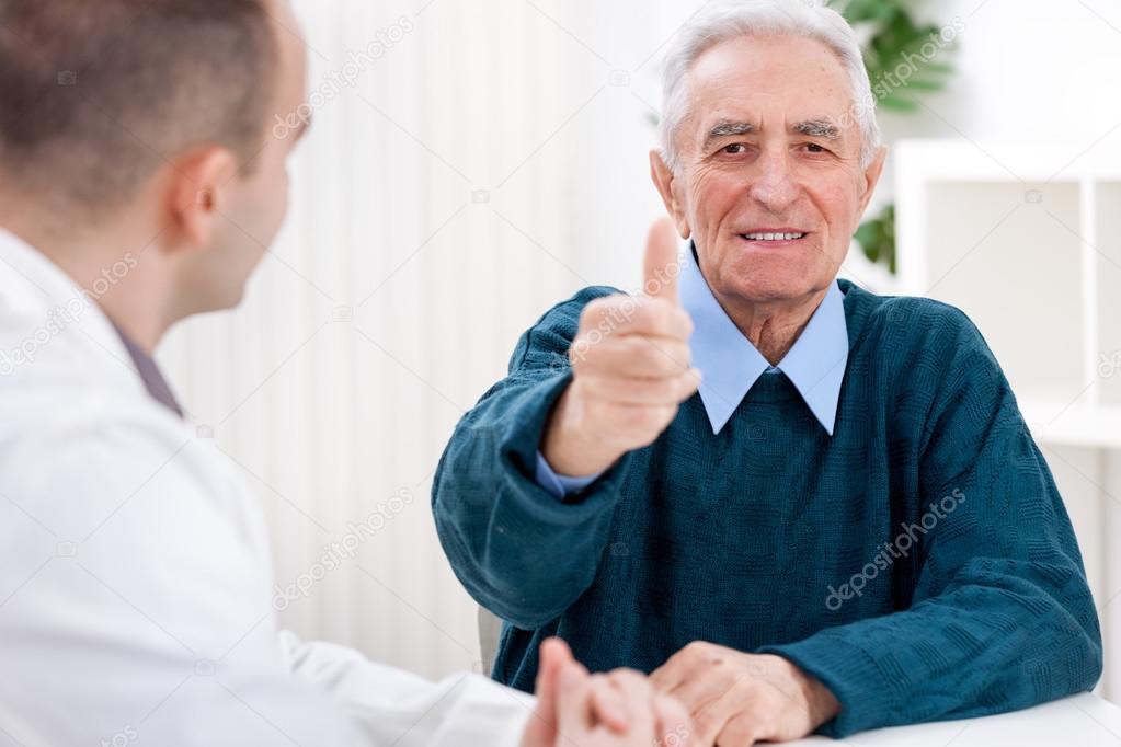 Satisfied patient at doctor — Stock Photo © luckybusiness #35598747