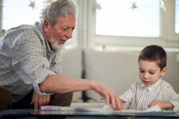 Grandfather teaching grandson Stock Photos, Royalty Free Grandfather ...