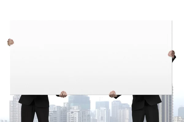 Businessman use two hands to lift up wooden white blank board i — Stock ...