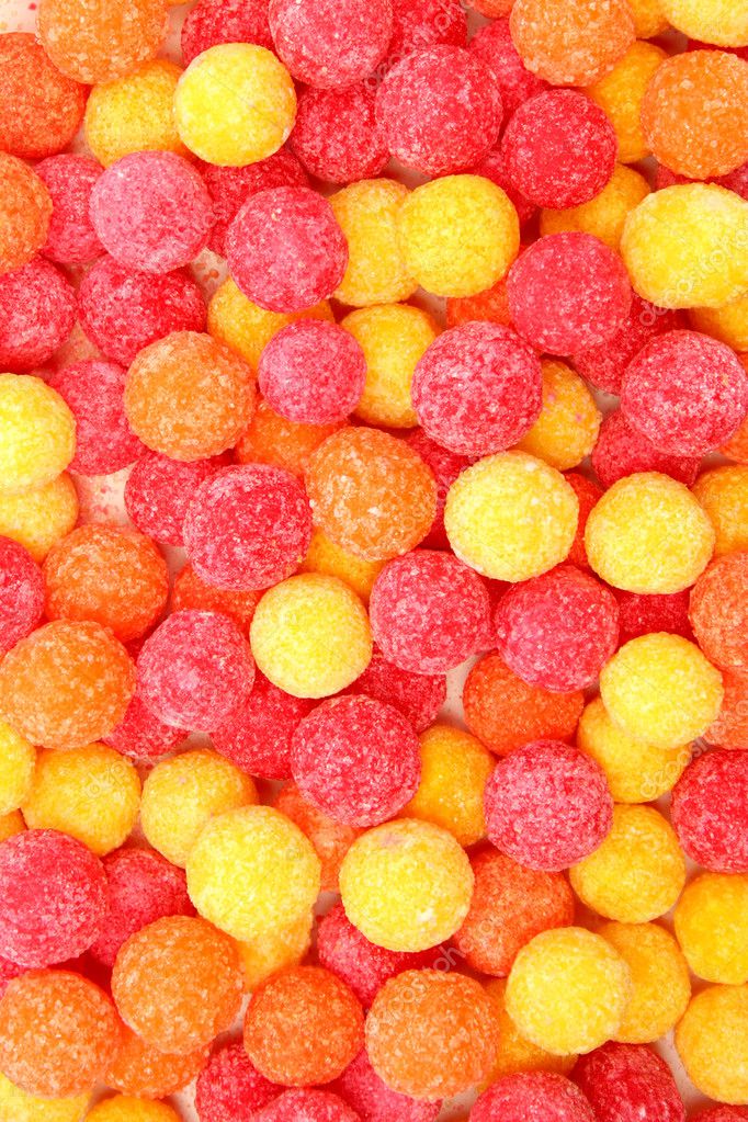 Dulces redondos de azúcar de color rojo y amarillo 2023