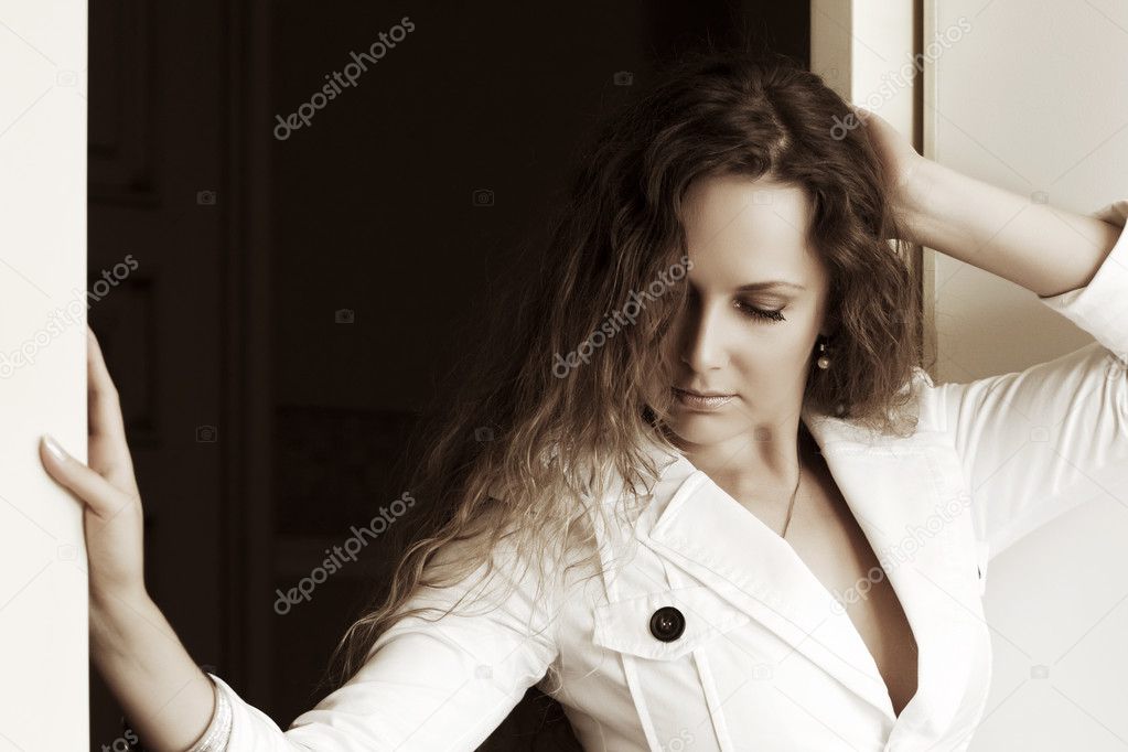 Beautiful woman looking down Stock Photo by ©wrangler 46392571