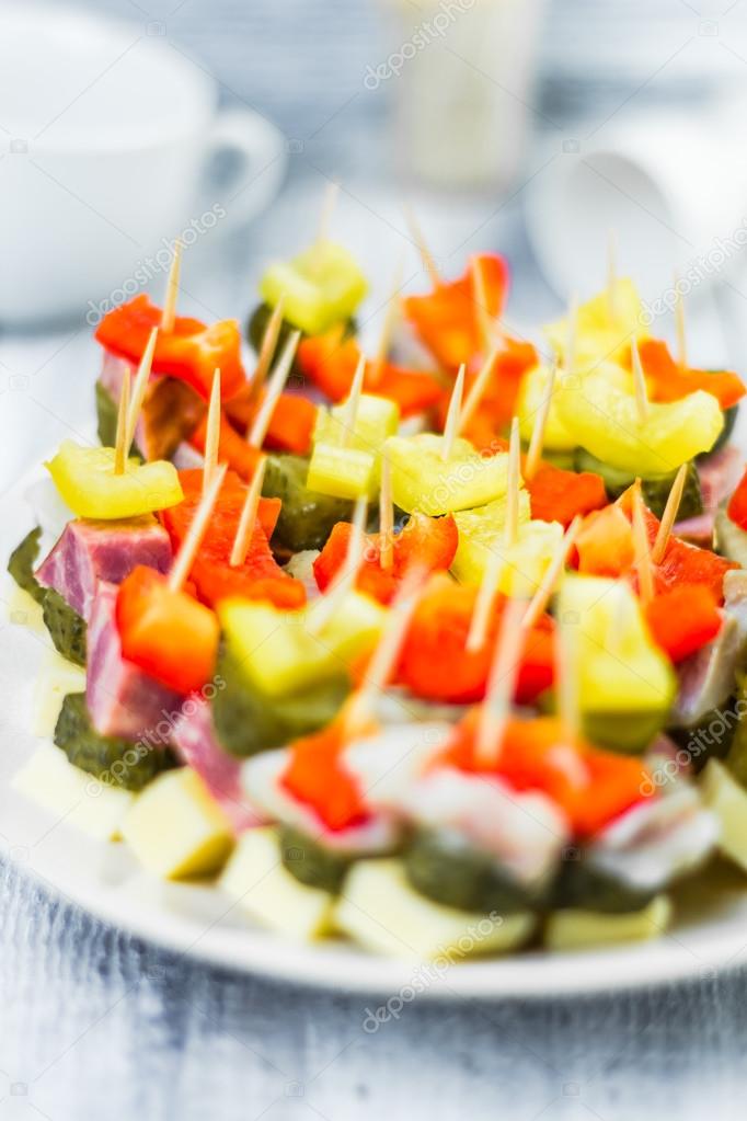 Finger foods toothpicks appetizer — Stock Photo © Yotka #39724055