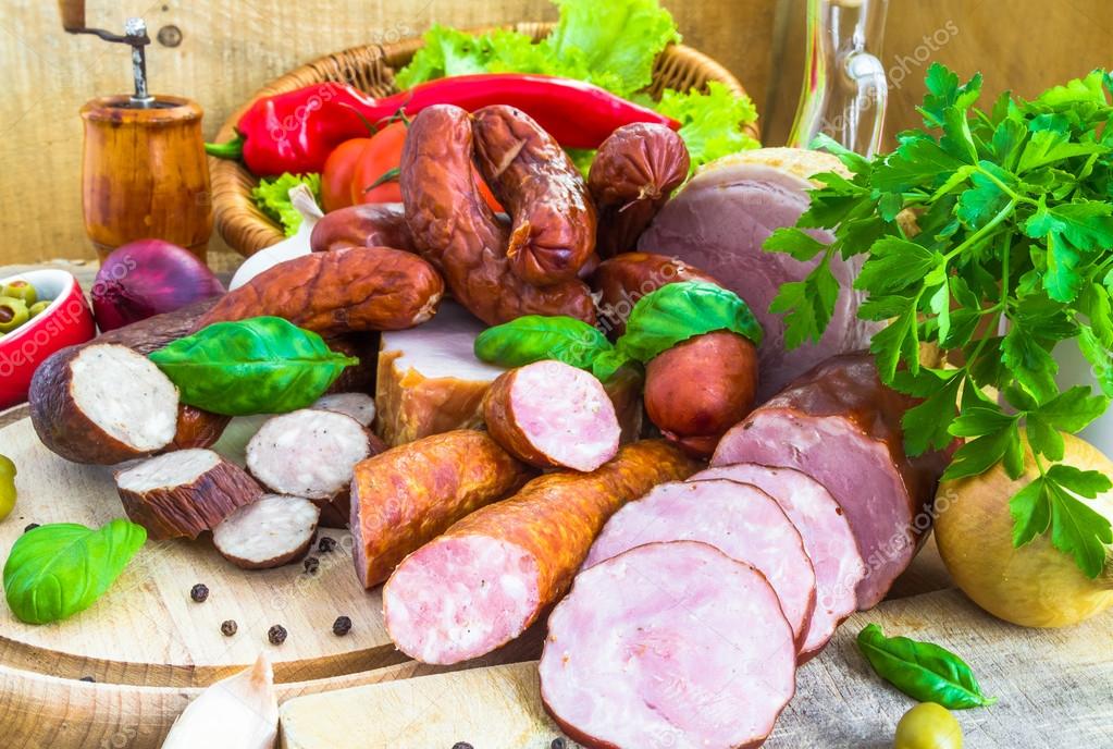 Variety processed meat products vegetables — Stock Photo © Yotka #46390495