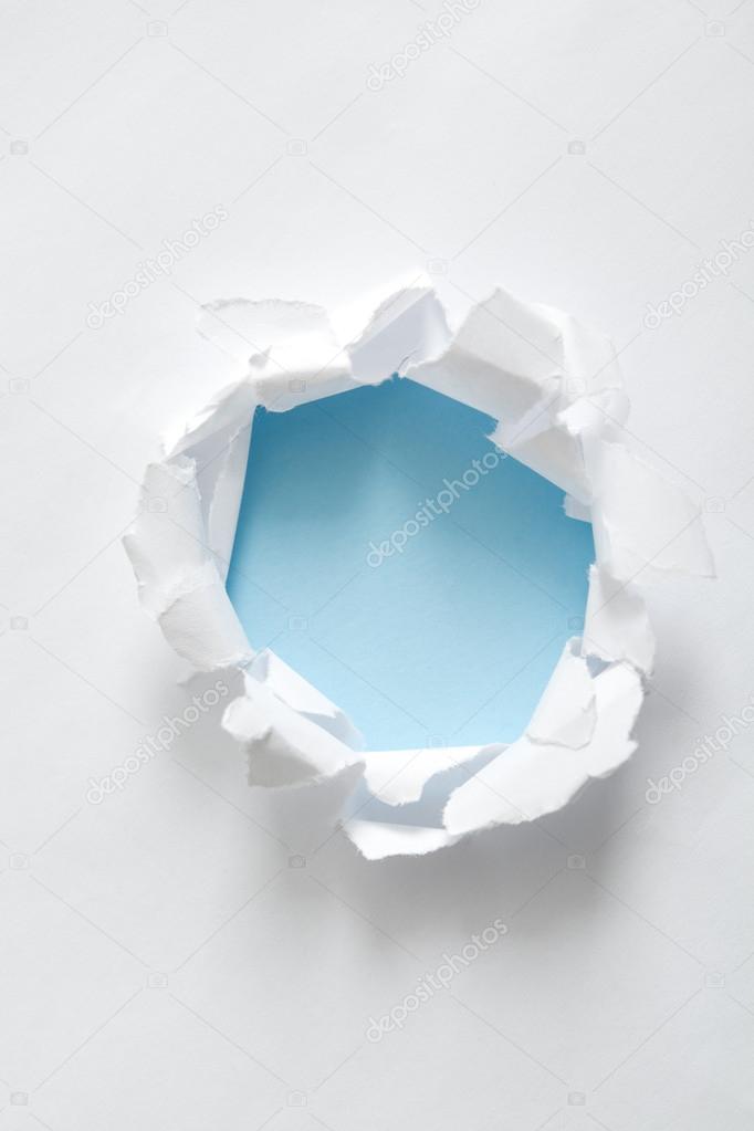 Torn paper circle on blue Stock Photo by ©agencyby 13195539