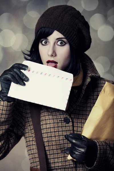 Young postman girl with mail. Photo in old color style with boke Stock Photo by ©massonforstock ...