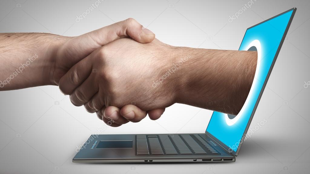 A hand comes right out of the laptop screen to shake hands CONCEPT ...