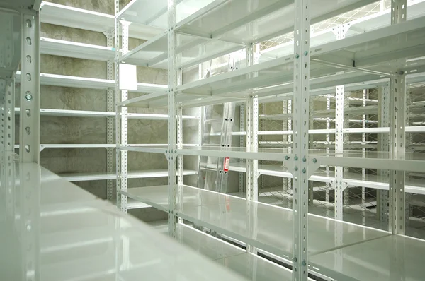 Empty warehouse, storage racks — Stock Photo © vladek #22799436