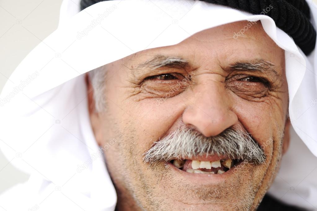 Mature Arabic man with traditional clothes — Stock Photo © ZouZou #12665544