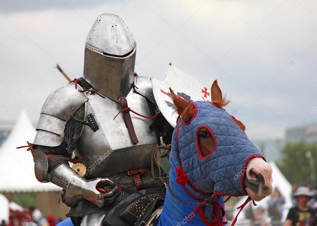 Medieval knight on horseback, side view — Stock Photo © worklater #27461901