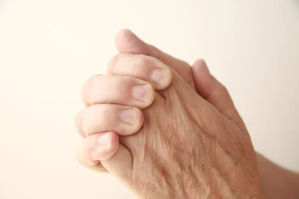 Man squeezing his hand Stock Photo by ©aliced 13657348