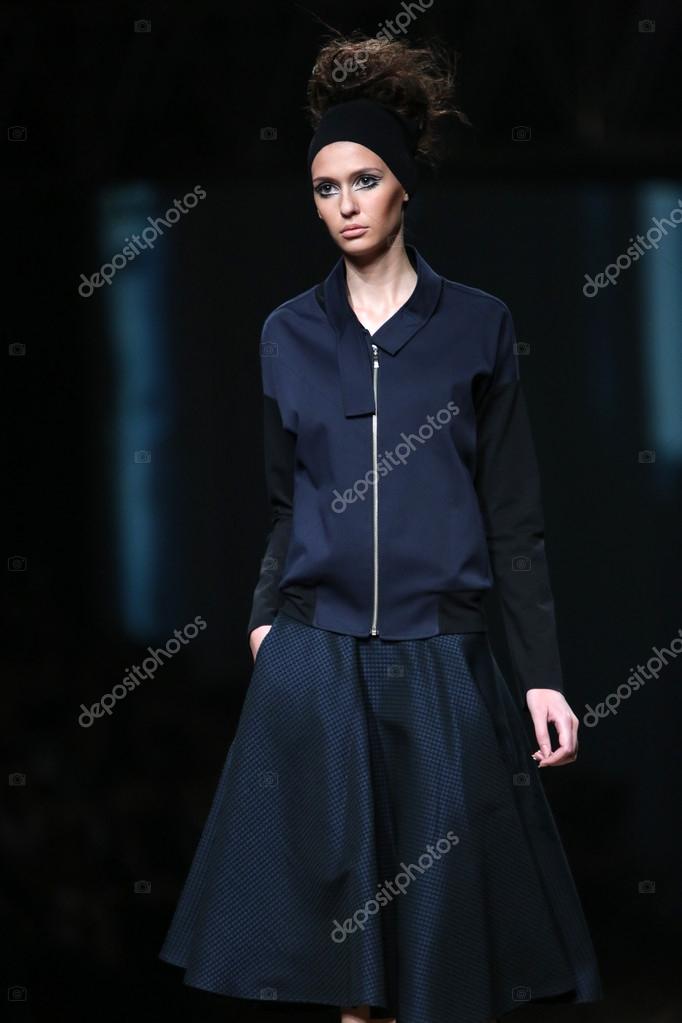 Fashion model wearing clothes designed by XD Xenia Design on the Cro a ...