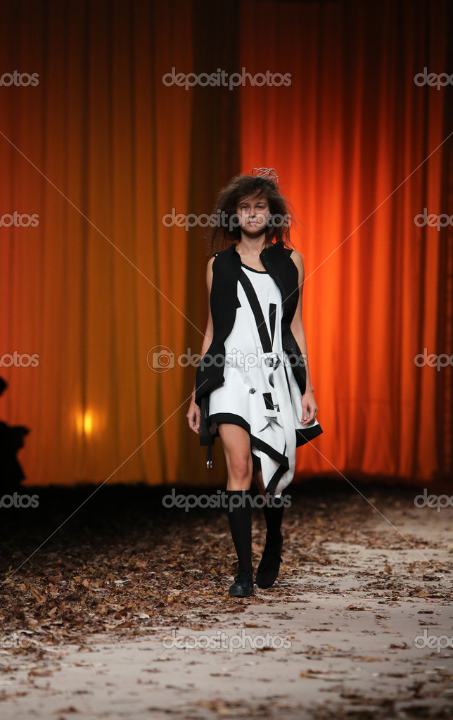 Fashion model wearing clothes designed by Madame Demode on the Cro a ...