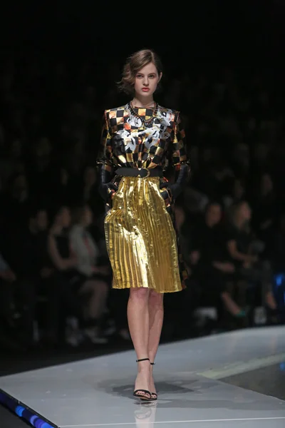 Fashion model wearing clothes designed by Robert Sever on the 'Fashion ...