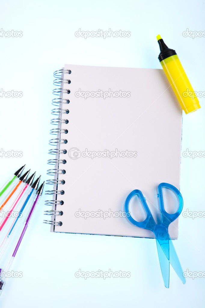 Notepad with school supplies Stock Photo by ©JanPietruszka 12751477