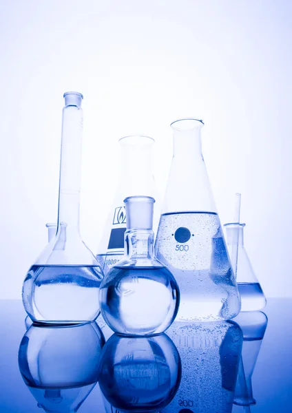 Glass laboratory equipment Stock Photo by ©JanPietruszka 30692227