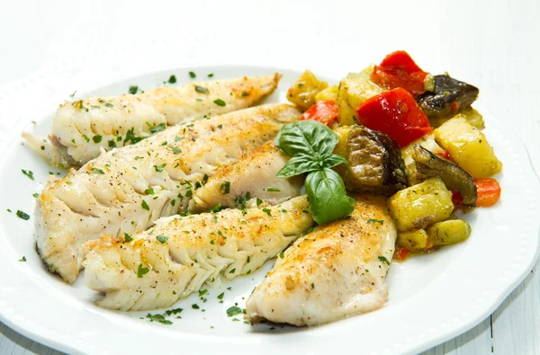 Fish fillet with vegetables — Stock Photo © lsantilli #12092092
