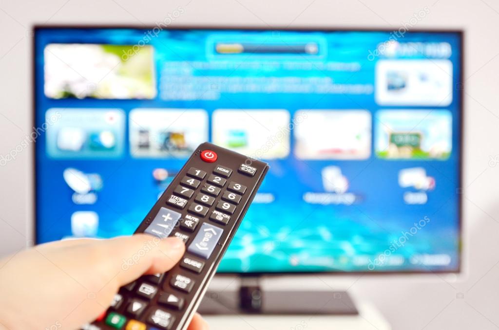 Smart tv and hand pressing remote control ⬇ Stock Photo, Image by ...