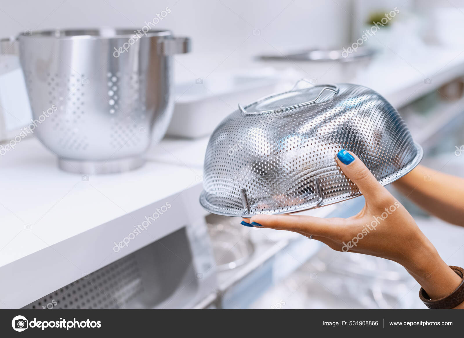 Housewife Holds Her Hands Chooses Metal Colander Cooking Pasta Store ...