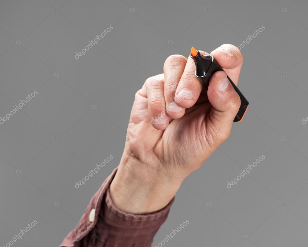 Hand holding marker Stock Photo by ©palinchak 15381365