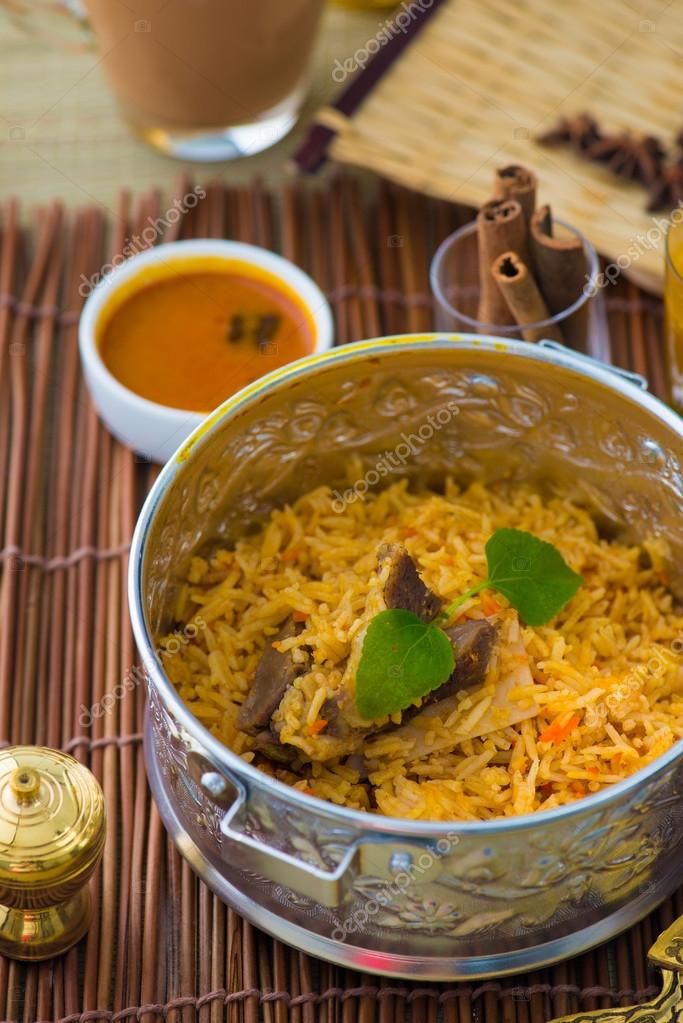 Chicken biryani in small wok — Stock Photo © yuliang11 #35849289