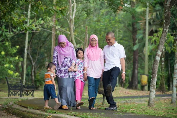 Malay family having fun in the park ,malaysian people - Stock Image ...