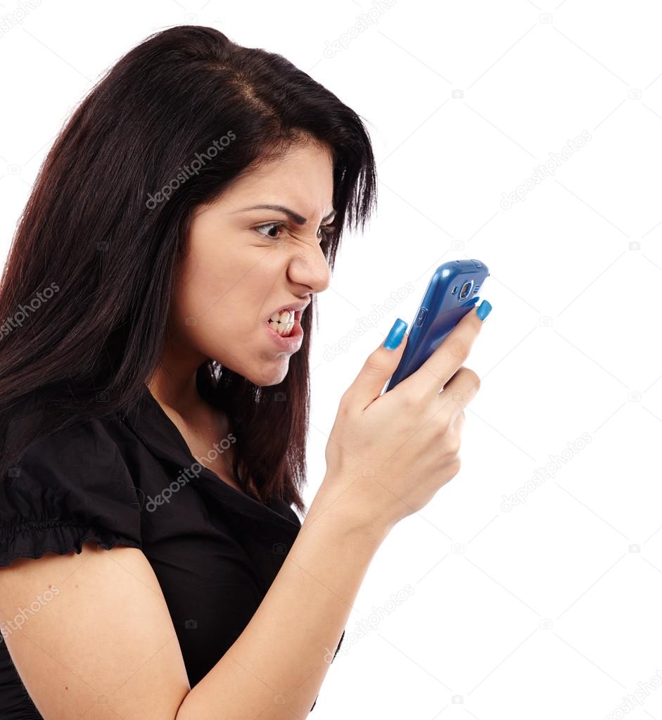 Angry woman talking on the phone Stock Photo by ©Xalanx 22301633