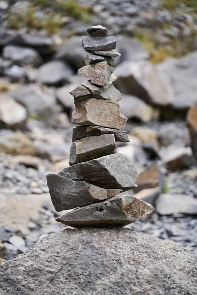 Person stacking stones Stock Photos, Royalty Free Person stacking ...
