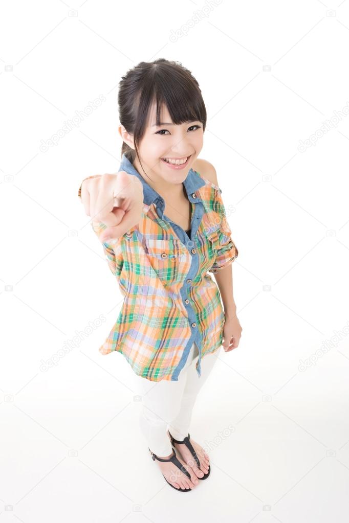 Young pretty asian woman pointing forward — Stock Photo © elwynn #30189105