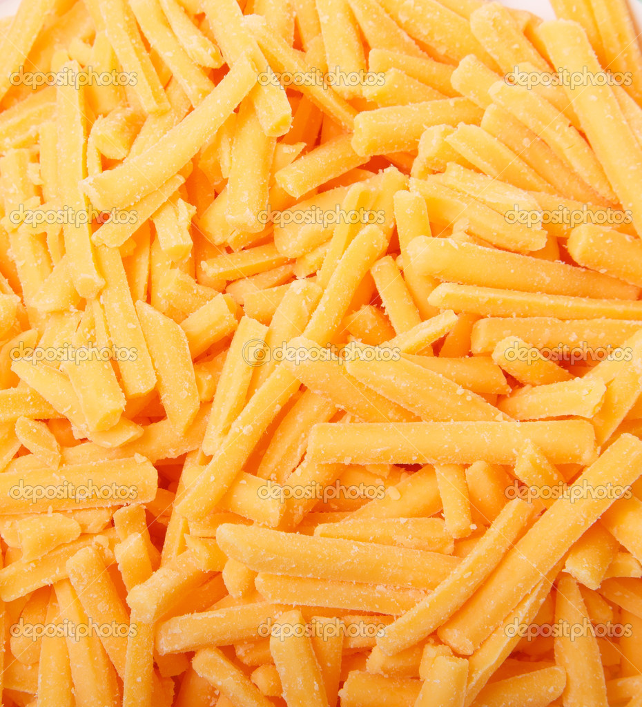 Fresh Shredded Cheddar Cheese — Stock Photo © dbvirago #25856171