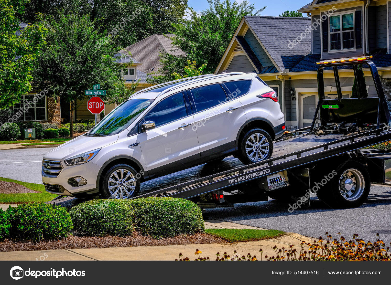 SUV Being Loaded Onto Flatbed Tow Truck – Stock Editorial Photo ...