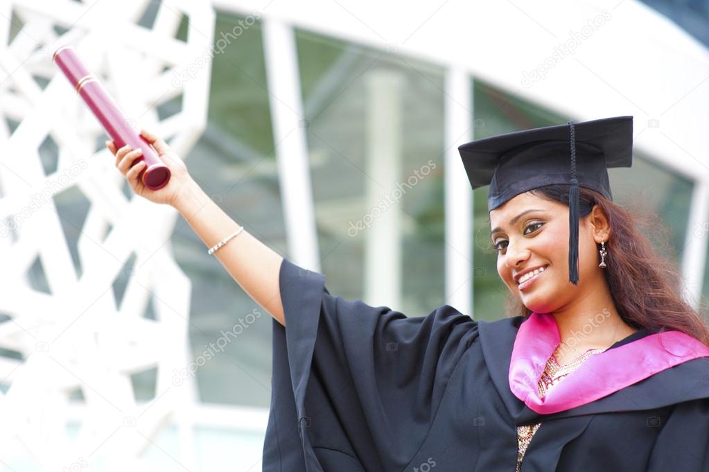 Indian in a graduation gown — Stock Photo © szefei #12487275