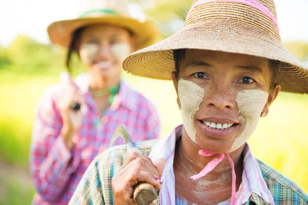 Traditional Myanmar female farmers greeting Stock Photo by ©szefei 95090660