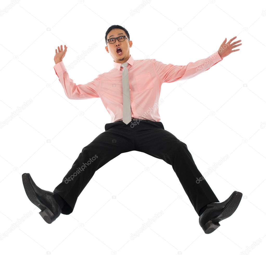 Asian businessman falling backwards — Stock Photo © szefei #27865027