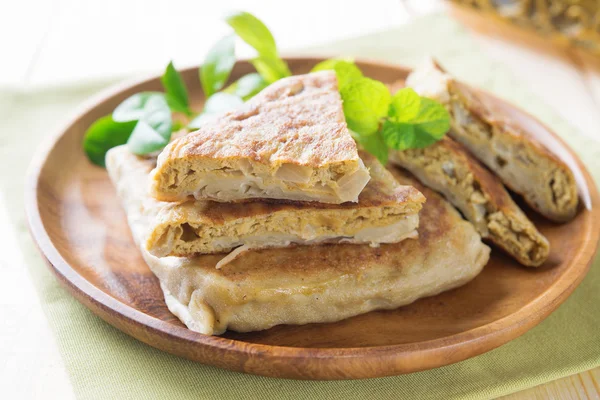 Mutabbaq or Murtabak is a stuffed Arabic bread Stock Photo by ©szefei ...