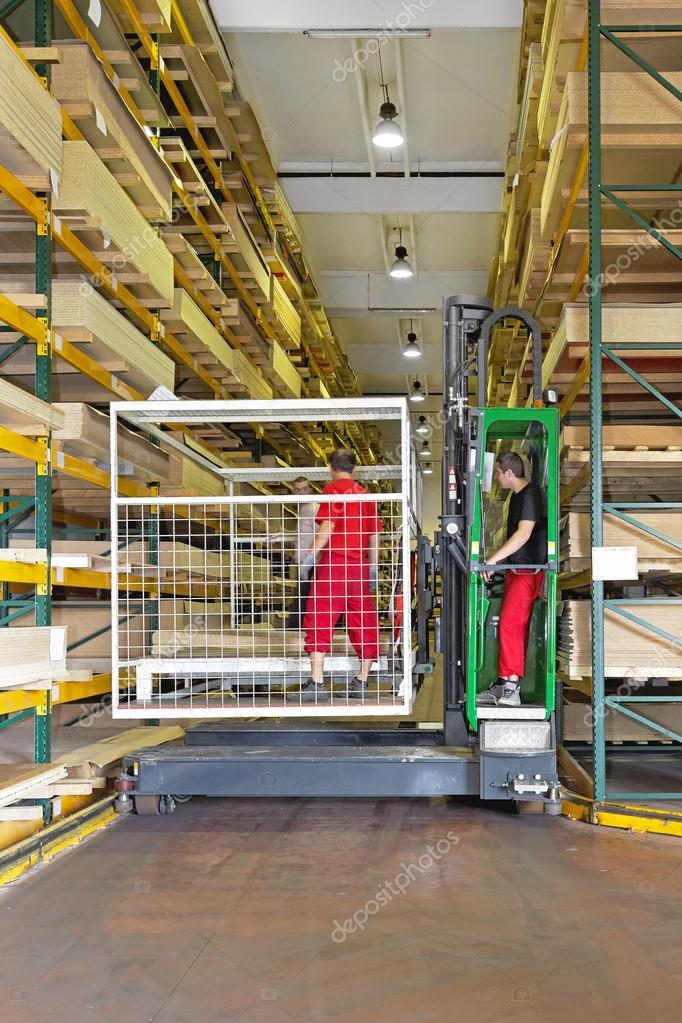 Forklift side loading — Stock Photo © Baloncici #37185645