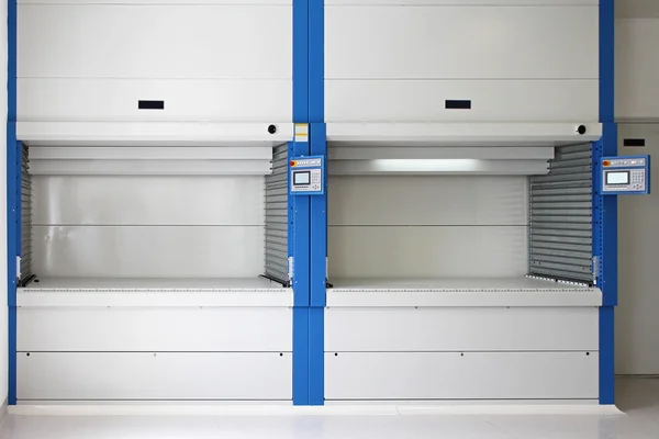 Vertical storage systems Stock Photo by ©Baloncici 32068817