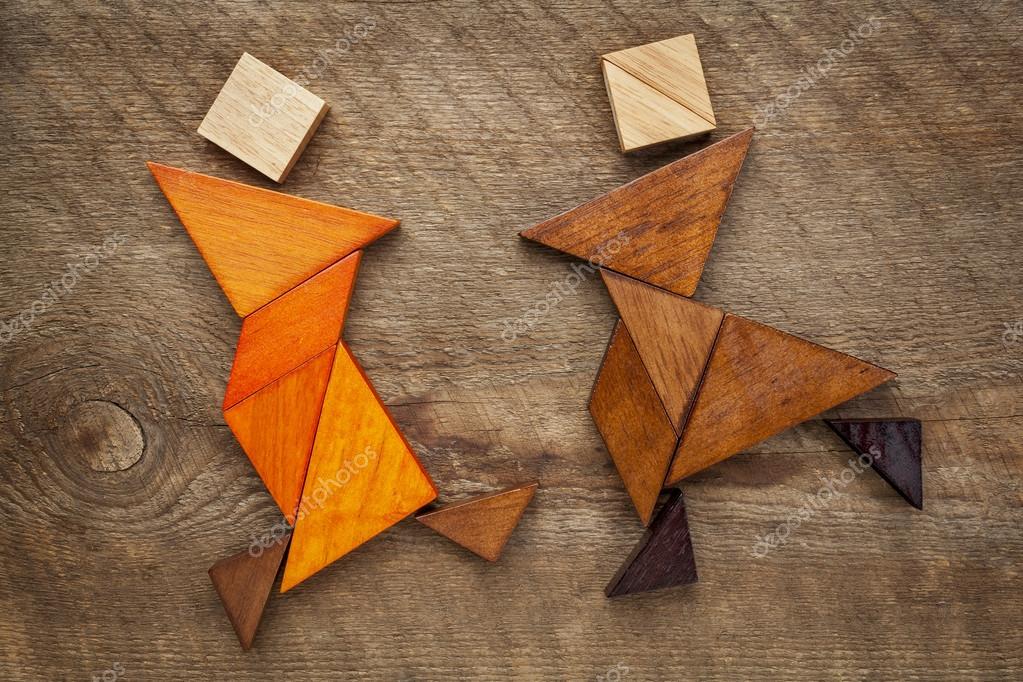 Dancing tangram figures — Stock Photo © PixelsAway #35704771