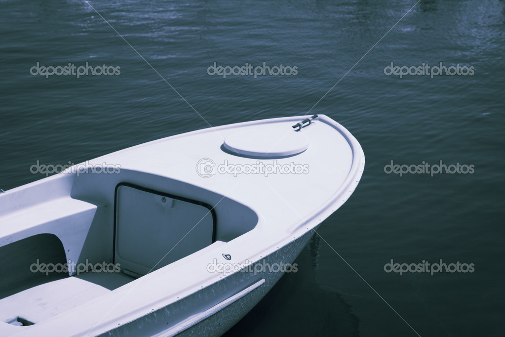 Old plastic small fishing boat in good condition Stock Photo by ...