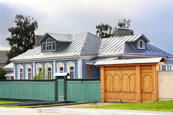 Stucco cottage homes | Corner Picket Fence with Small Stucco Cottage ...
