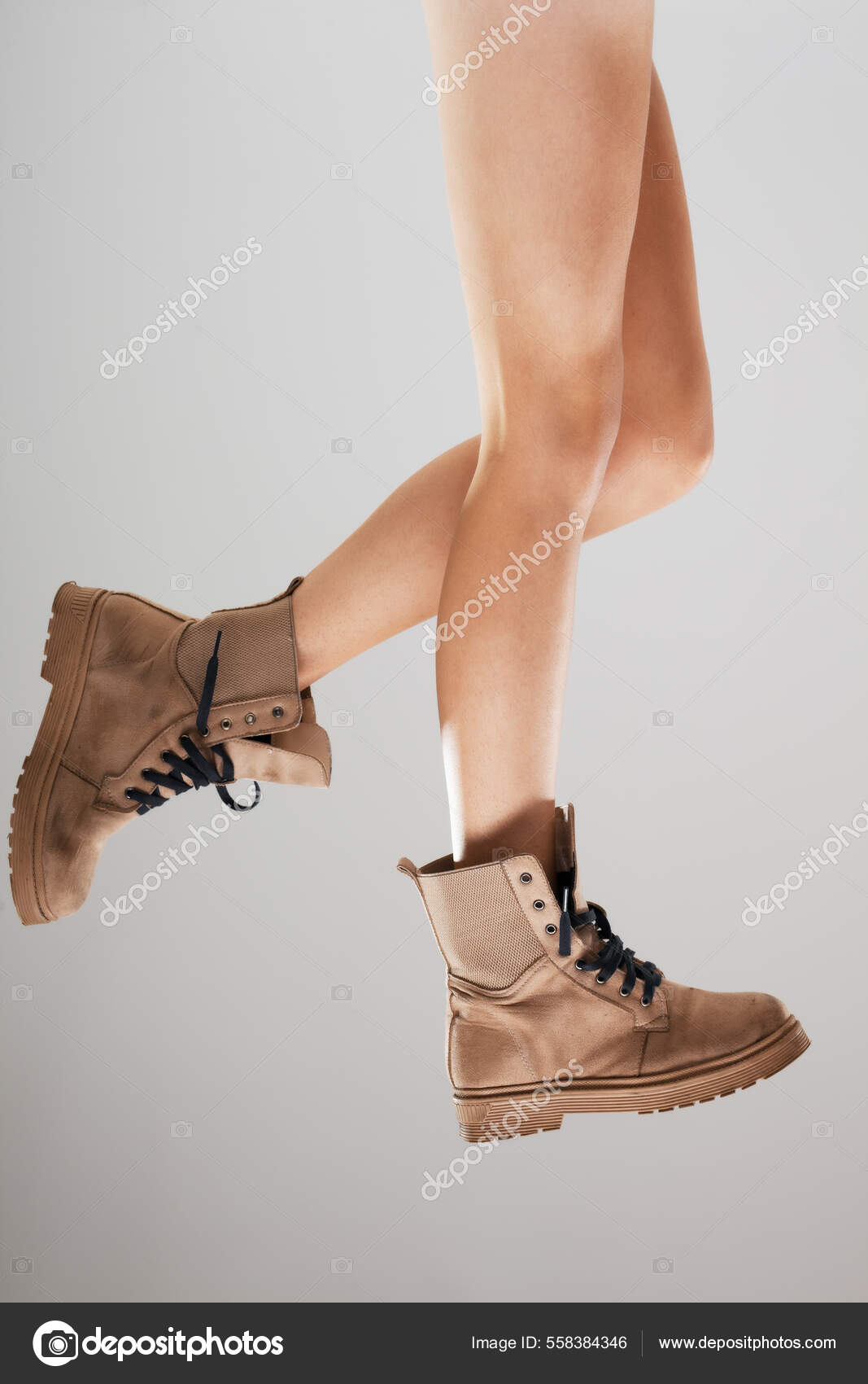 Sexy Female Legs Wearing Boots Gray Background Stock Photo by ©kokimk ...