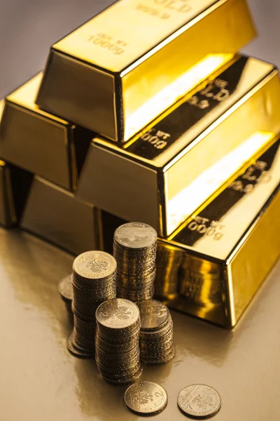 Gold bars on charts! Stock Photo by ©BrunoWeltmann 15793223